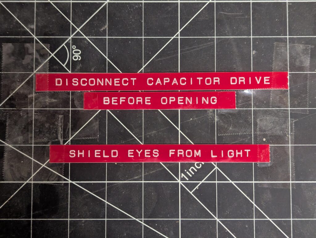 Flux Capacitor Red Embossed Labels – Pixel Props Store